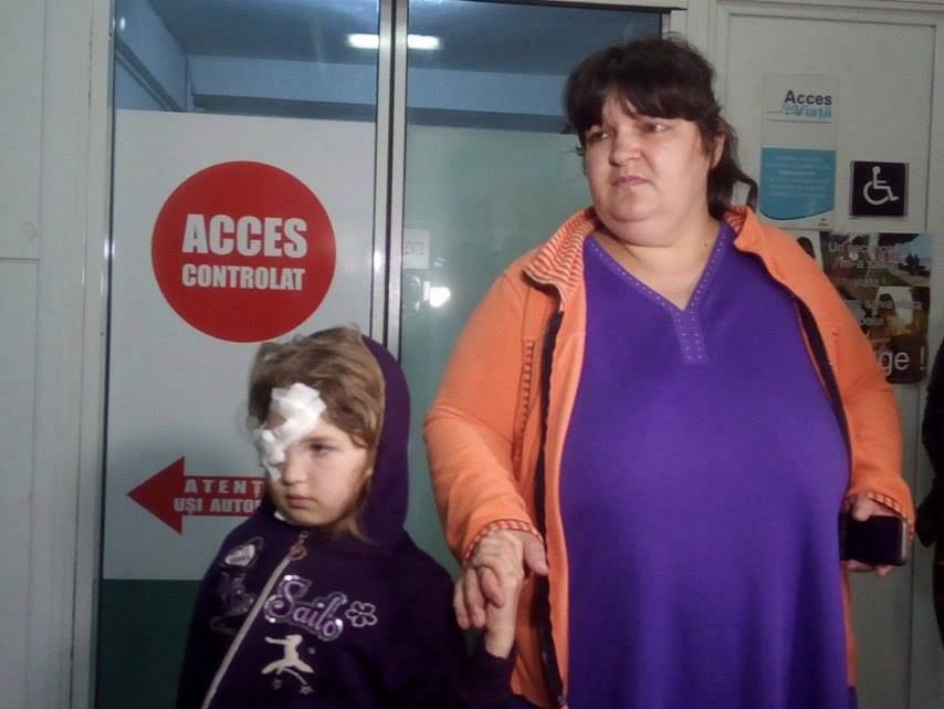 Fetita de opt ani, SFASIATA de un caine! Are fata mutilata si risca sa ...